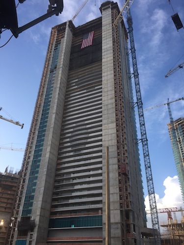 Displaying Old Glory on one of the tallest buildings in Miami ...